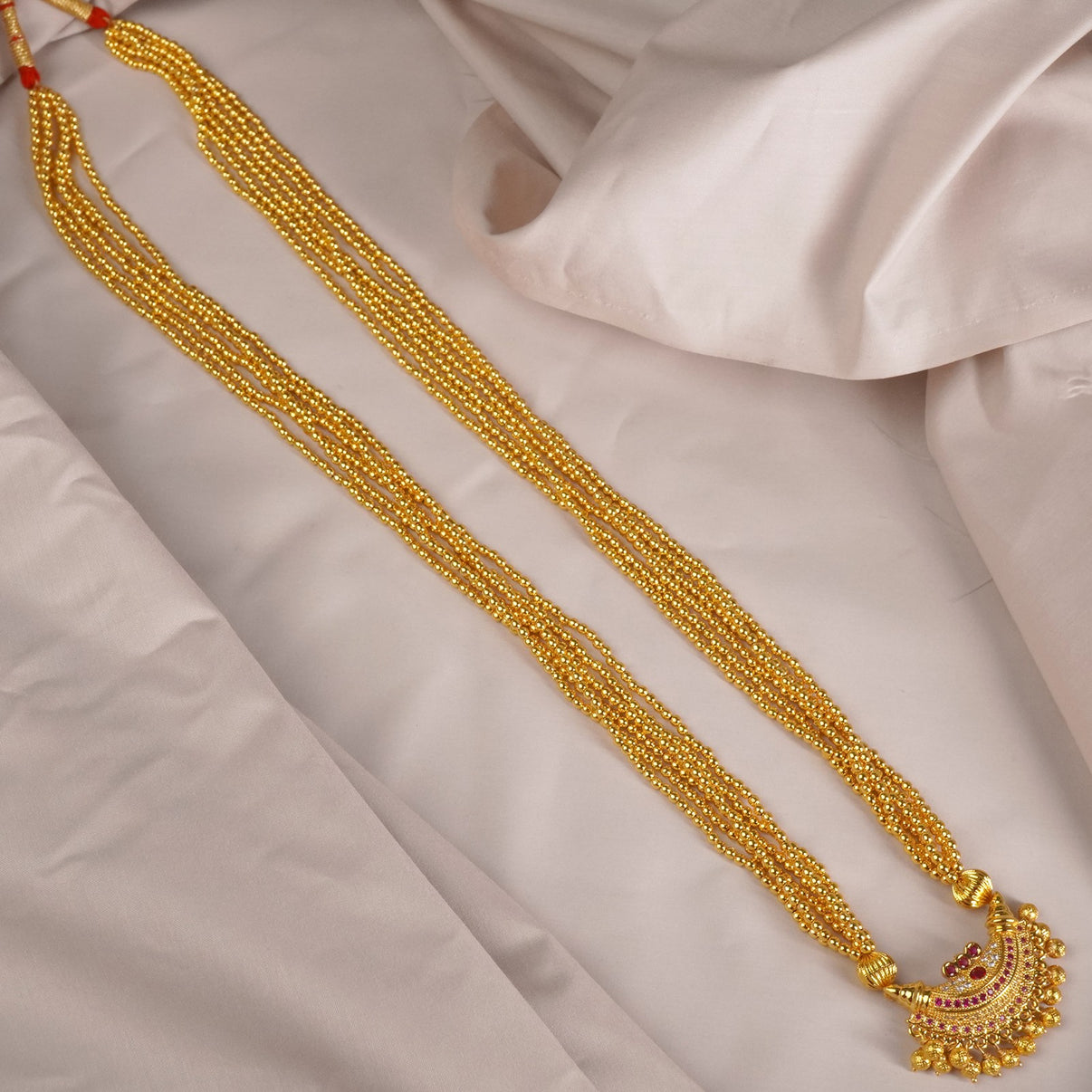 Buy online Long Kolhapuri Thushi Pattern With Chandrakor Pendant ...